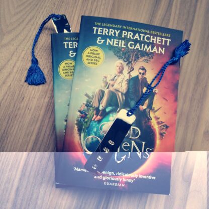 OUR COMPETITON | GOOD OMENS BOOK + SILVER BOOKMARK (T&Cs) - Broadway Silver